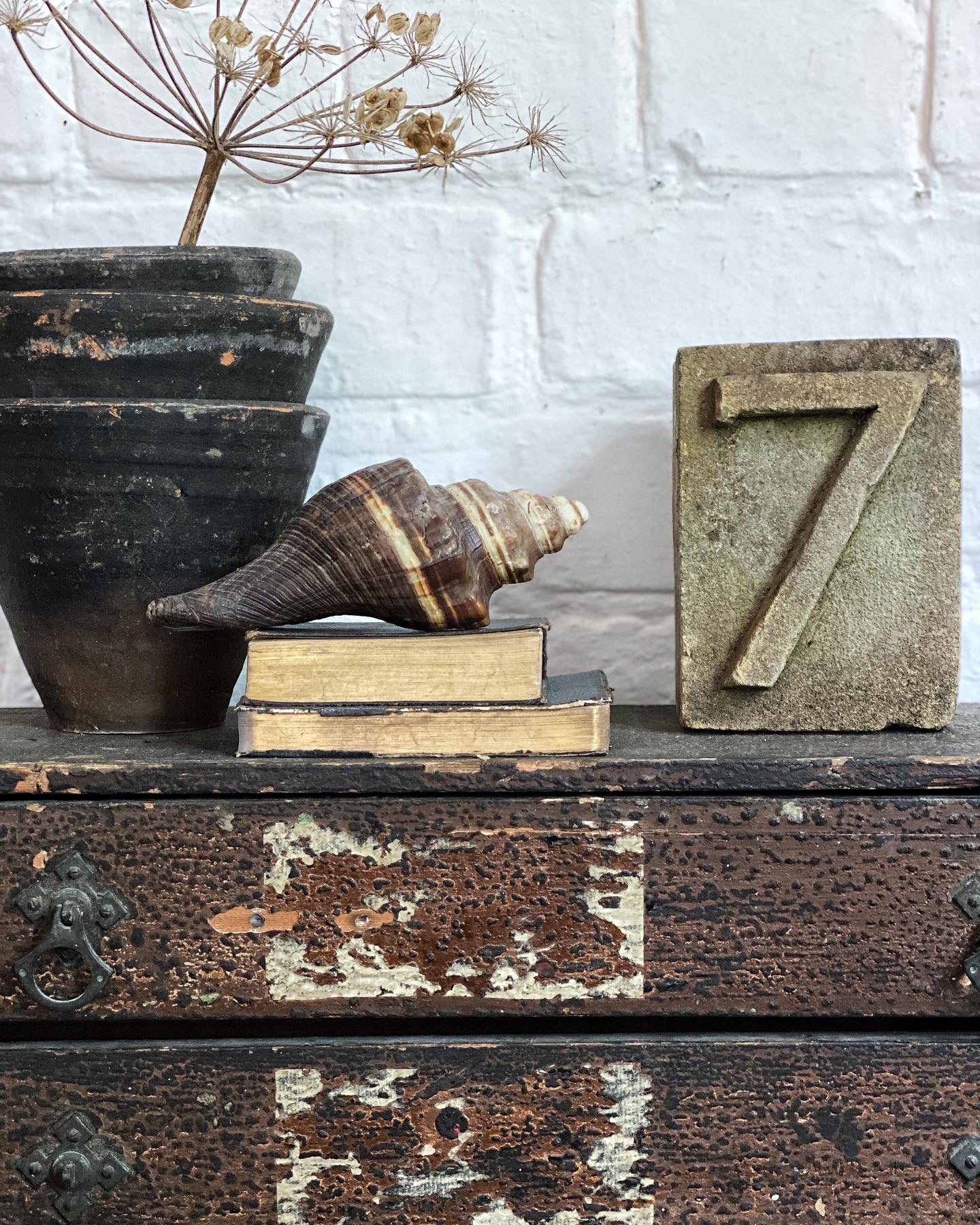 A solid stone reclaimed salvaged vintage carved cube with a 1930's fon ...
